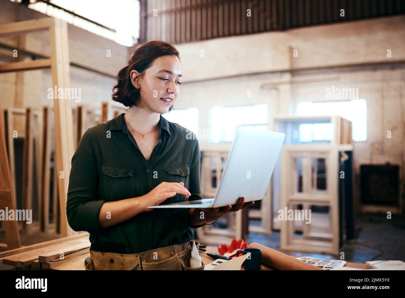 Female architect using a laptop hi-res stock photography and images - Alamy