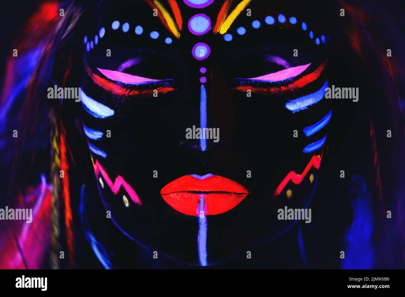 Model in image of Native american with neon makeup, which made of ...