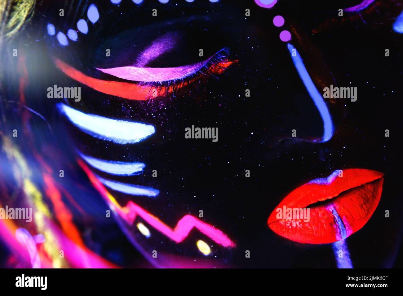 Model in image of Native american with neon makeup, which made of ...