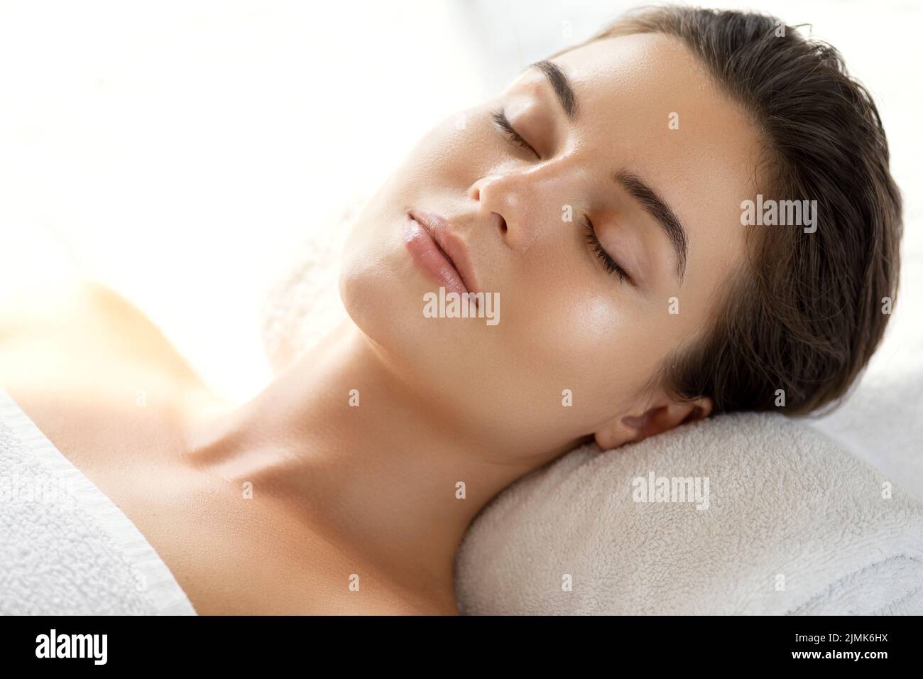 Beautiful young woman with perfect smooth skin Stock Photo - Alamy
