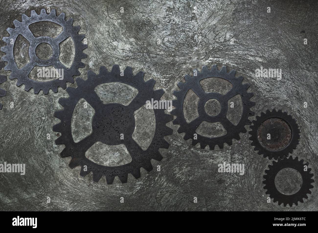 Old and rusty gears inside the concrete wall Stock Photo - Alamy