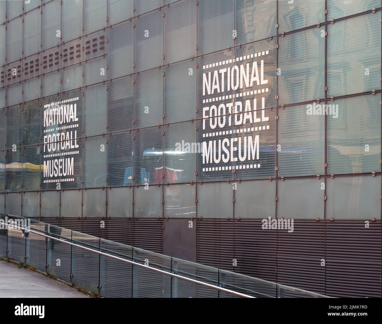 Signs on the windows of the national football museum in manchester city ...