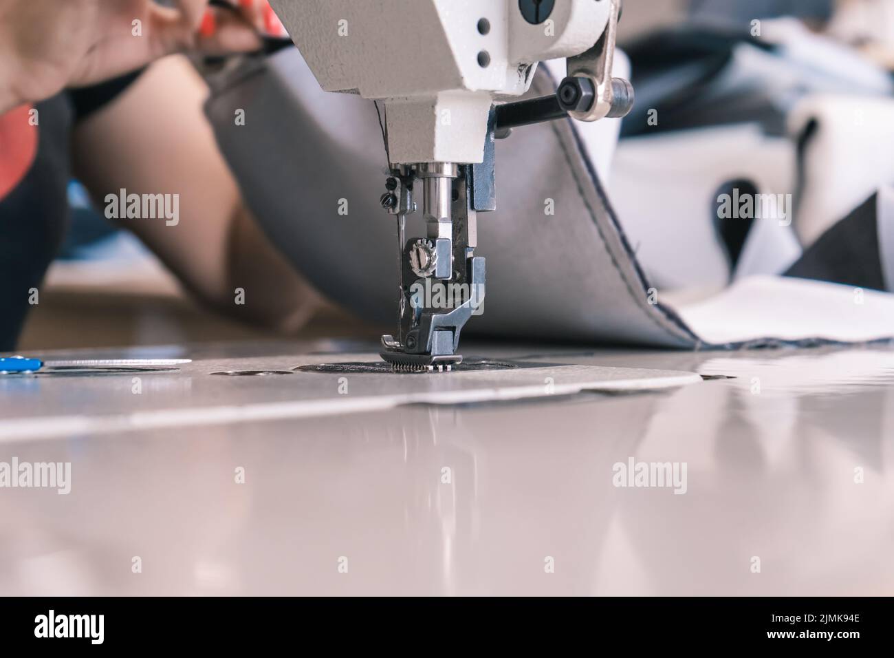 Sewing machine needles close-up in the workshop Stock Photo - Alamy