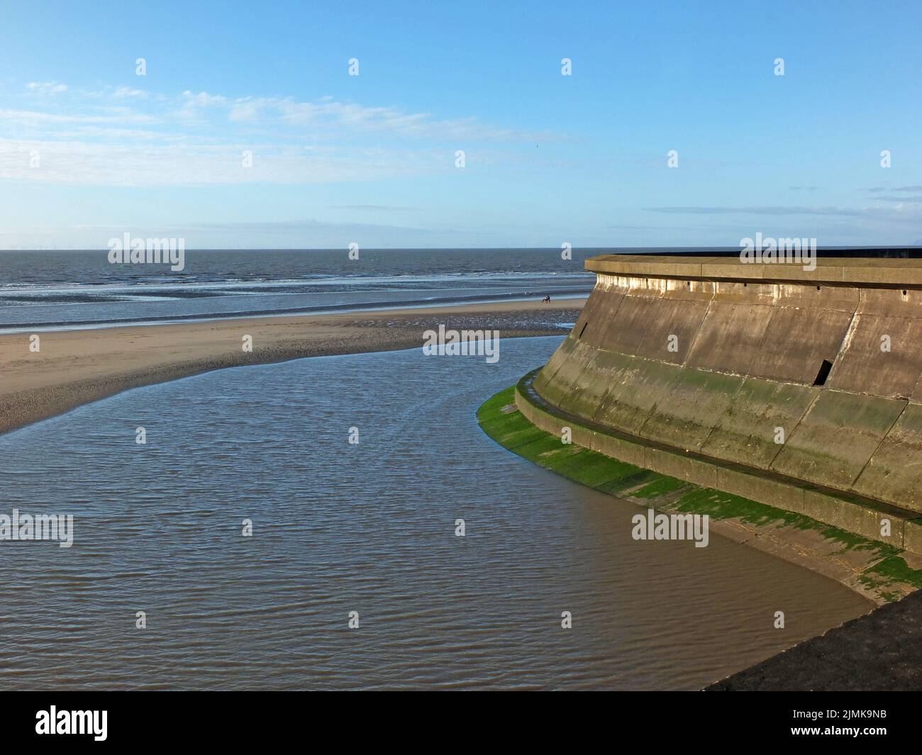 View of the concrete seawall in the cliffs area blackpool with the ...