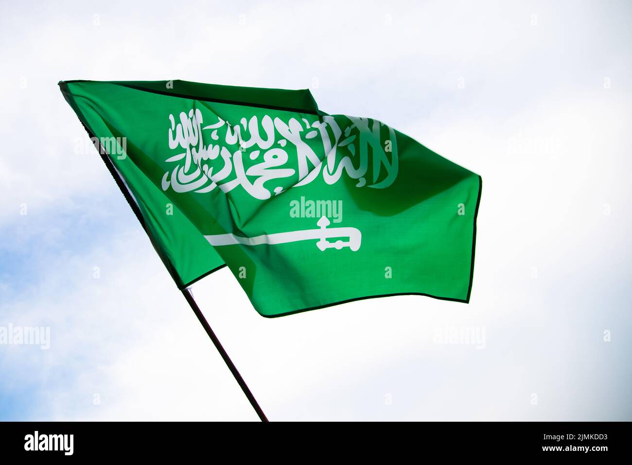 Saudi Arabia flag, Statement translation: There is no God but Allah ...