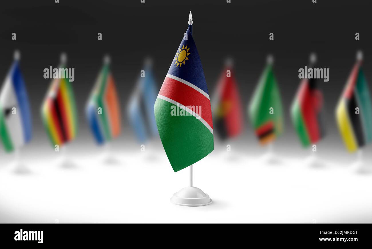 The national flag of the Namibia on the background of flags of other ...