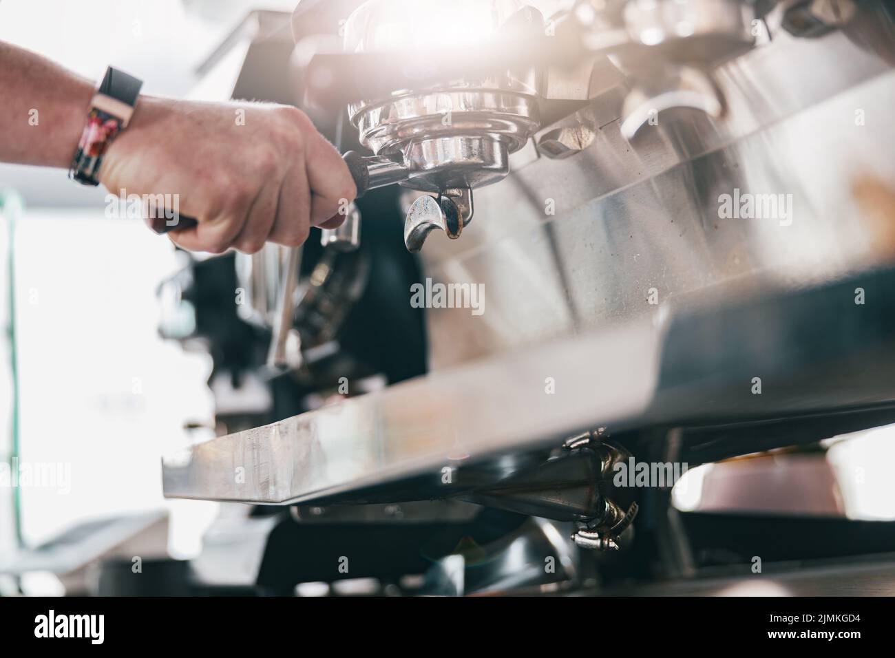 Process of preparing coffee on coffee machine in restaurant. Blurred ...
