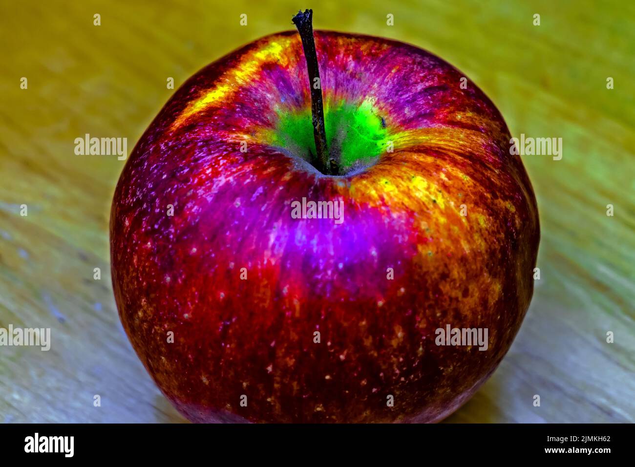 The colourful apple on the table Stock Photo - Alamy