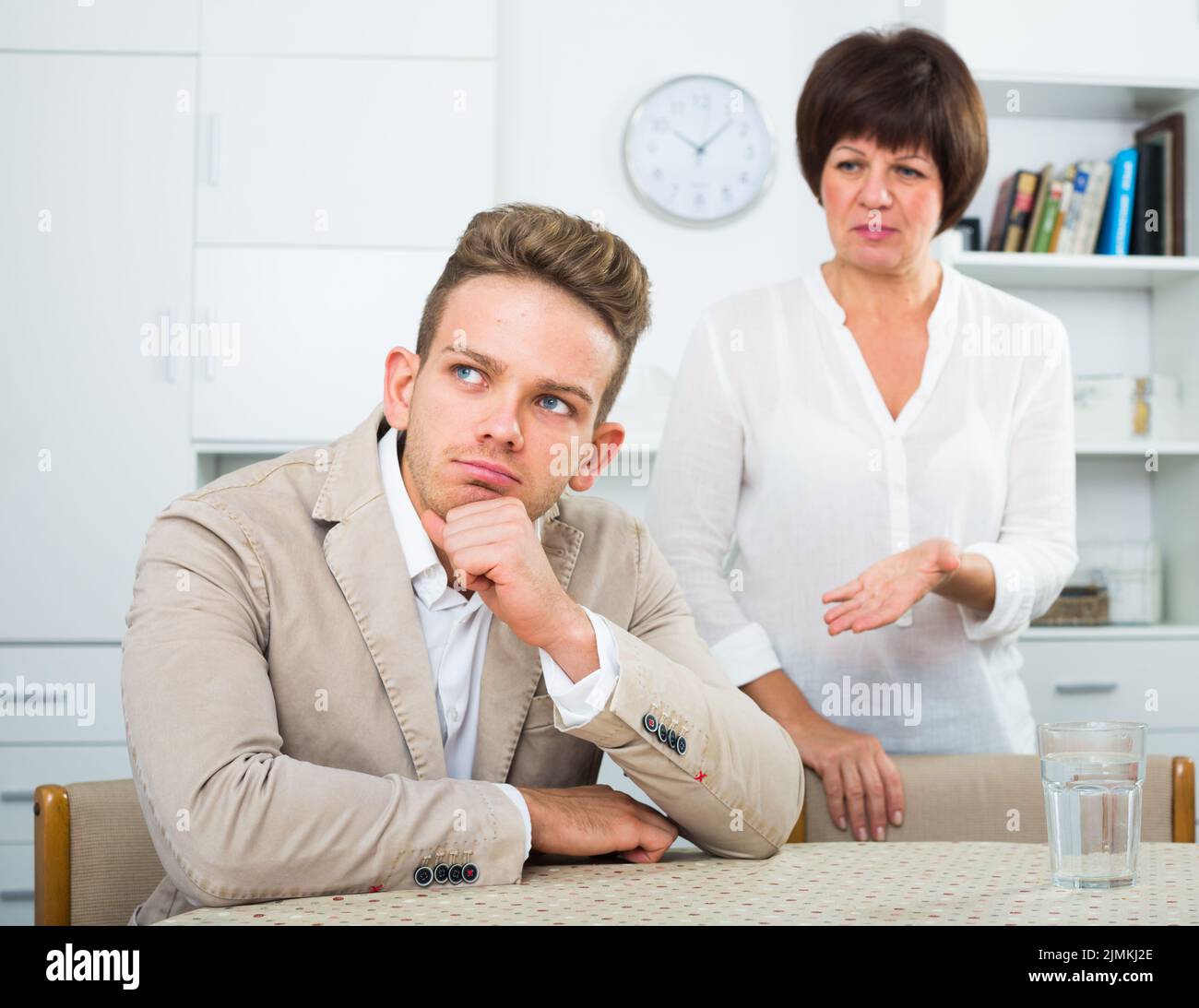 woman tries to persuade man Stock Photo - Alamy