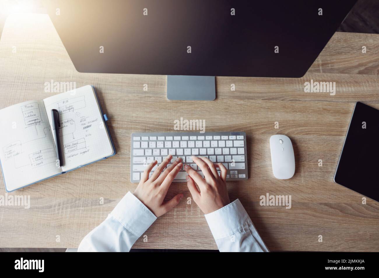 Close up of business woman hands working using keyboard of computer in ...