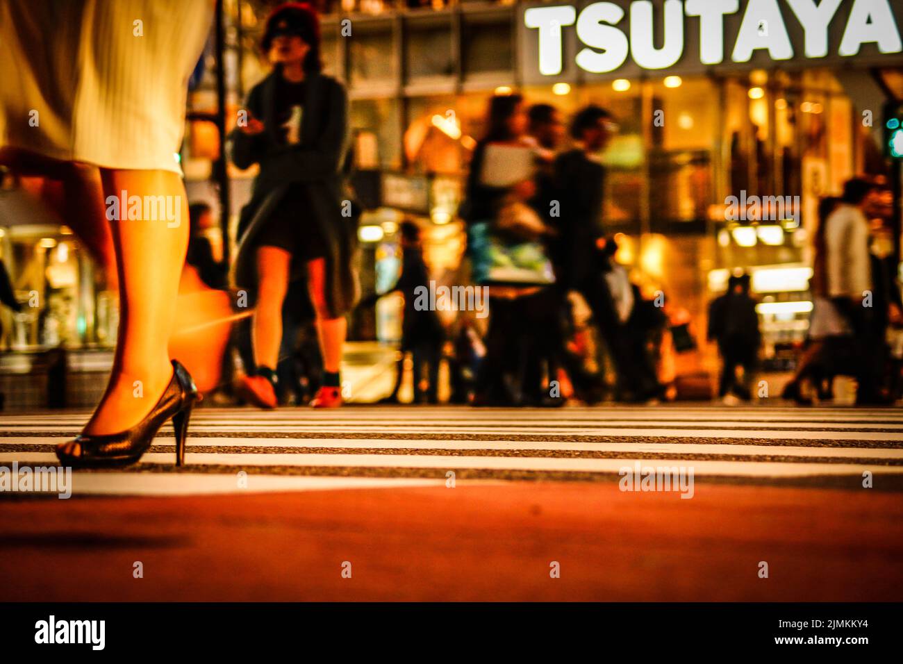 Feet of those who walk the Shibuya scramble intersection Stock Photo ...