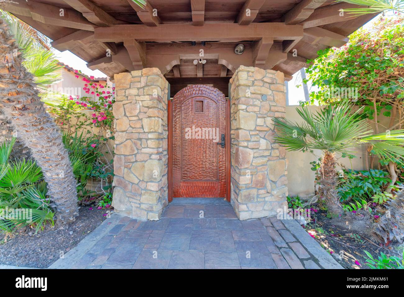 Wooden door gate with cctv on the ceiling at La Jolla, California. Door ...