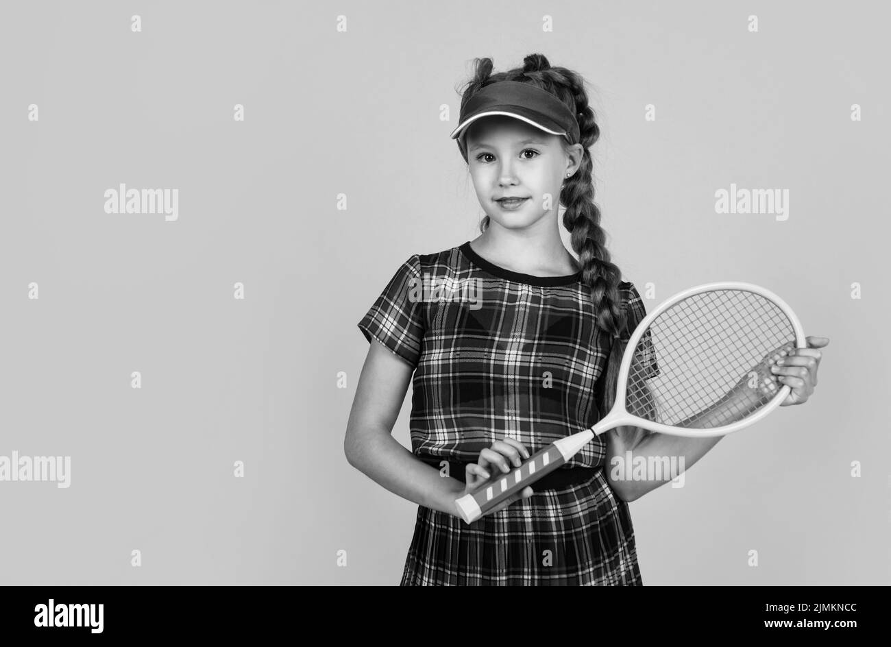 child hold badminton racket. kid tennis player. back to school. happy ...