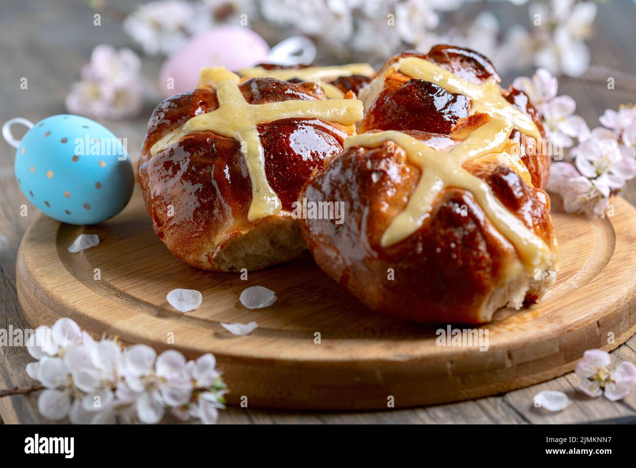 Easter buns with a cross close up Stock Photo - Alamy