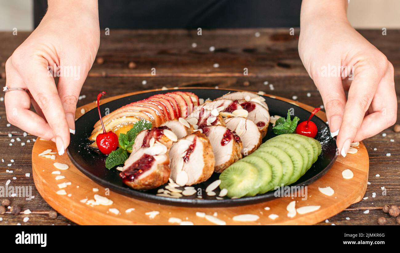 Waiter serving food restaurant hi-res stock photography and images - Alamy