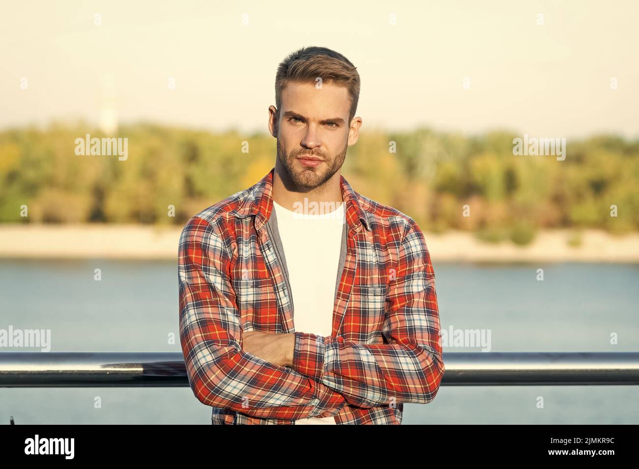 male fashion model. mens beauty. handsome man crossed hands Stock Photo ...