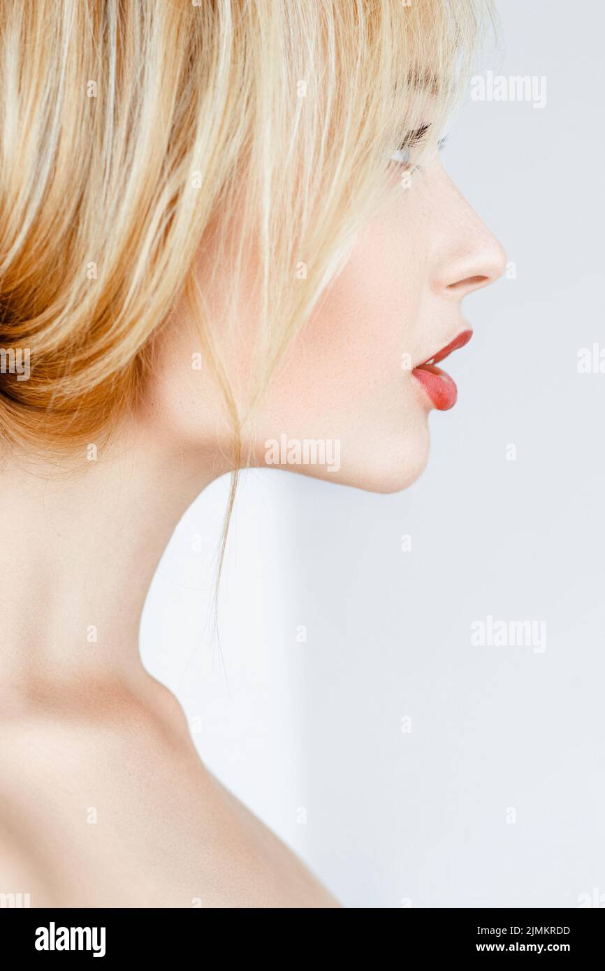 beauty care curious woman smooth skin red lips Stock Photo - Alamy