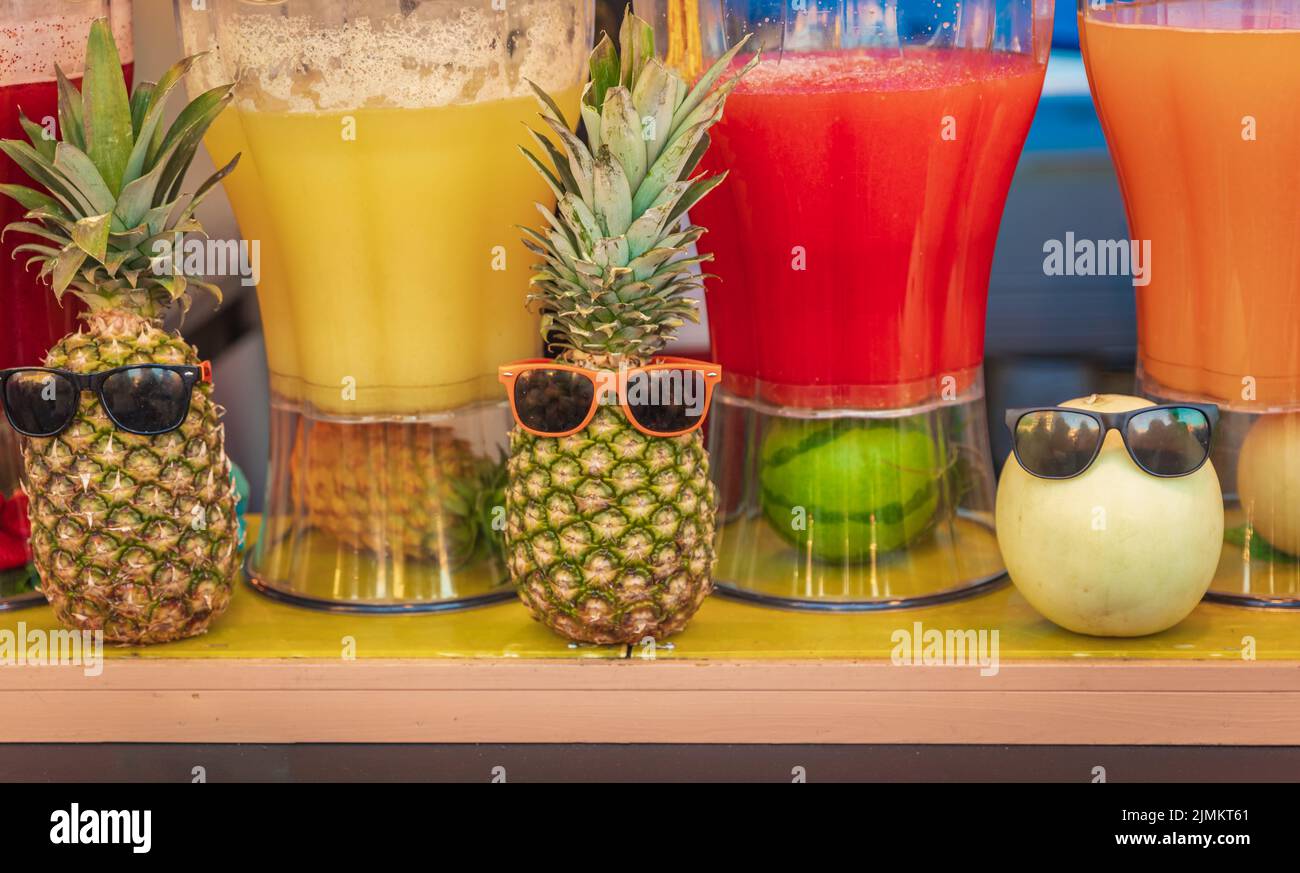 Fresh papaya, watermelon, pineapple and mango fruit juices decorated ...