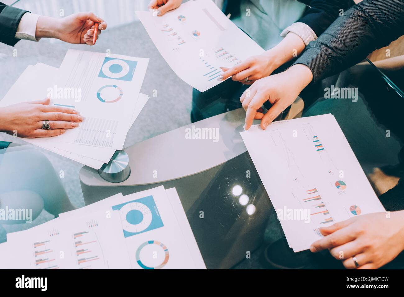 business paperwork professional team graphs charts Stock Photo - Alamy