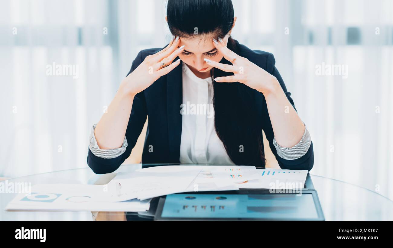 workaholic lifestyle tired business woman report Stock Photo - Alamy