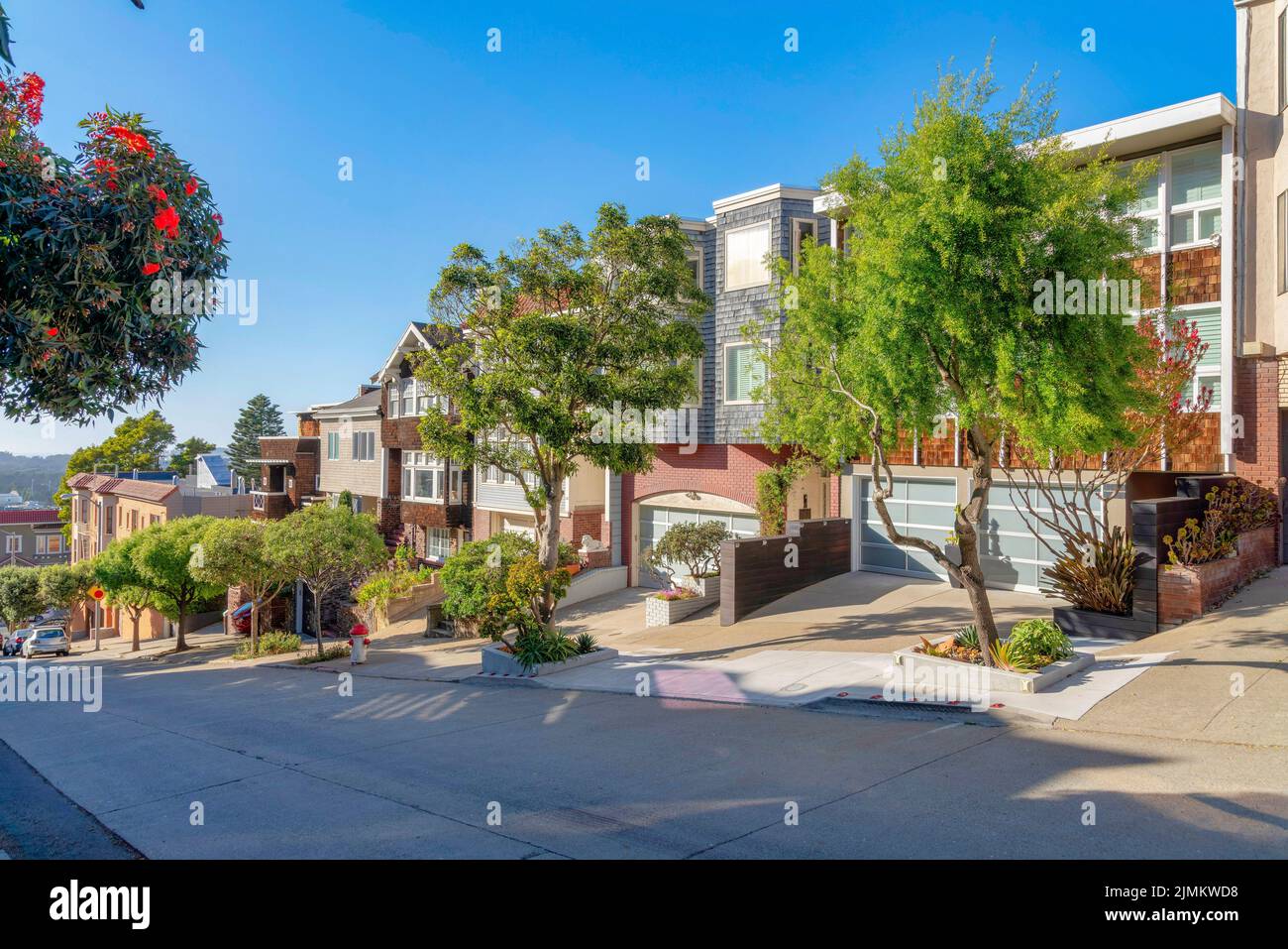 Sloped street in San Francisco, California near the complex suburban ...