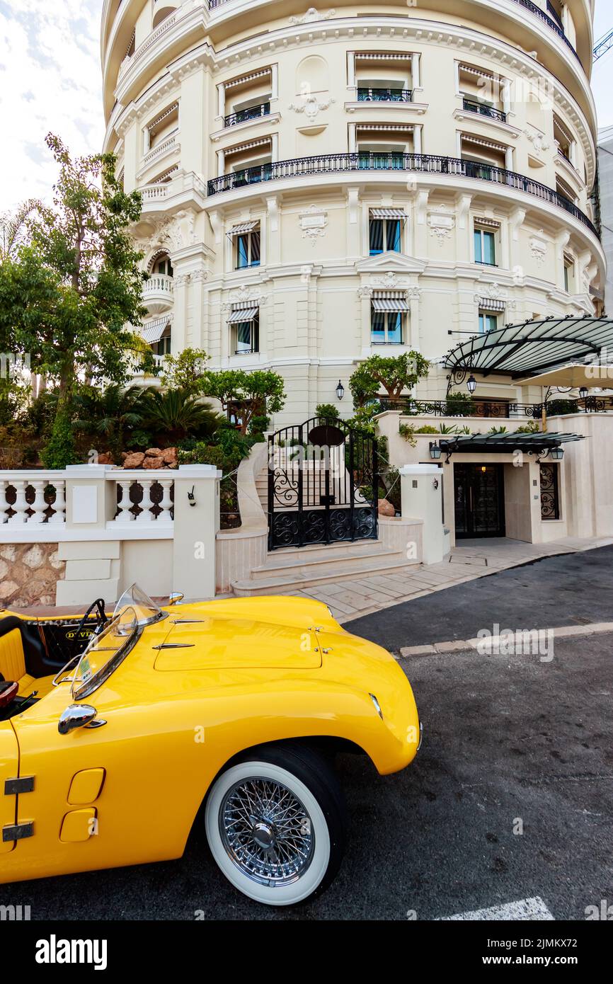 Monaco, Monte-Carlo, Vintage luxury yellow car on street, city life in summer time Stock Photo ...
