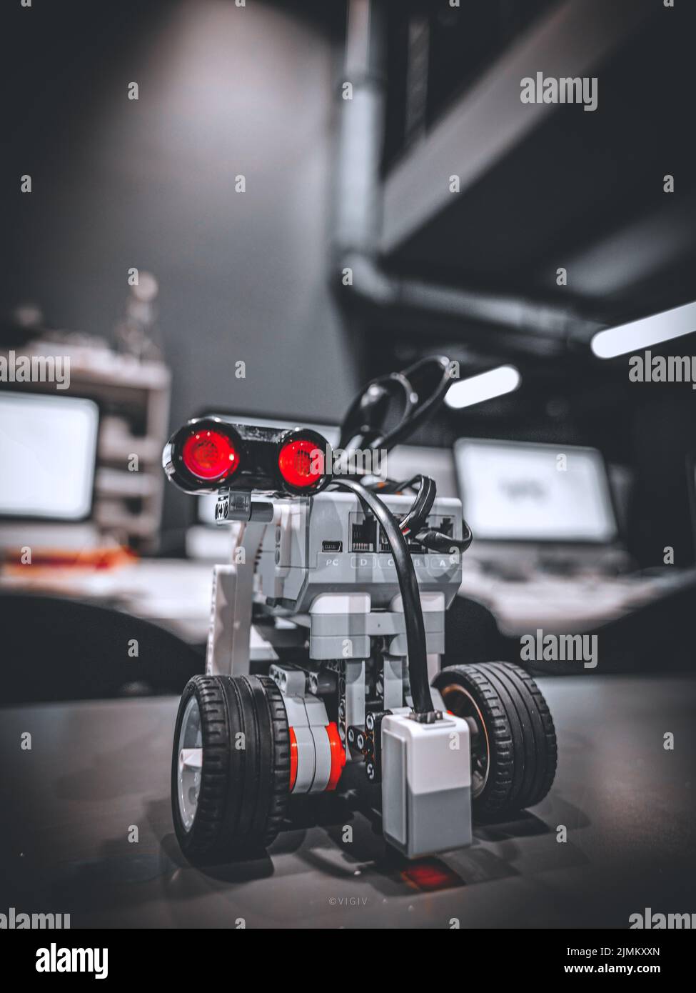 A Lego robot with wheels in the studio Stock Photo - Alamy