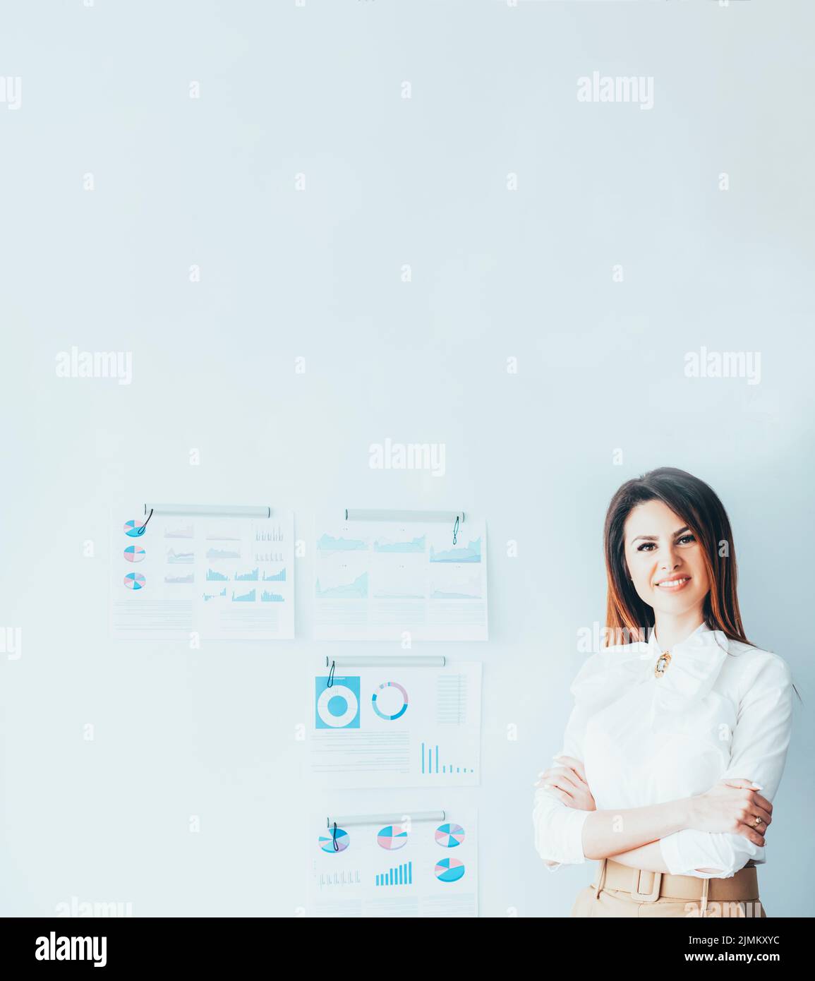 female leadership confident business woman charts Stock Photo - Alamy