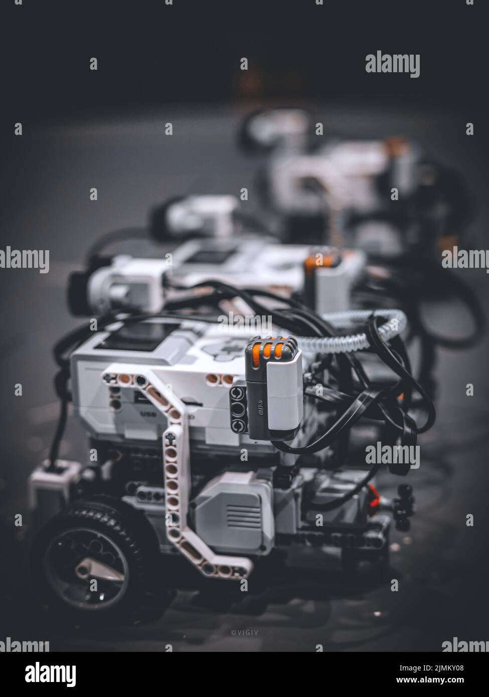 A Lego robot with wheels in the studio Stock Photo - Alamy
