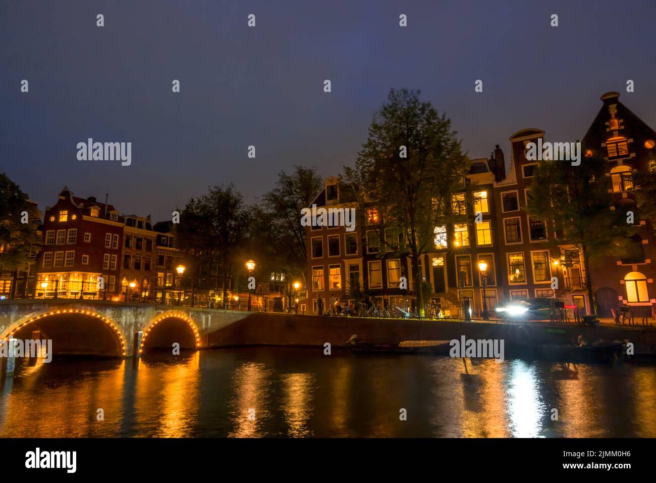 Night Lights on the Amsterdam Canal Stock Photo - Alamy