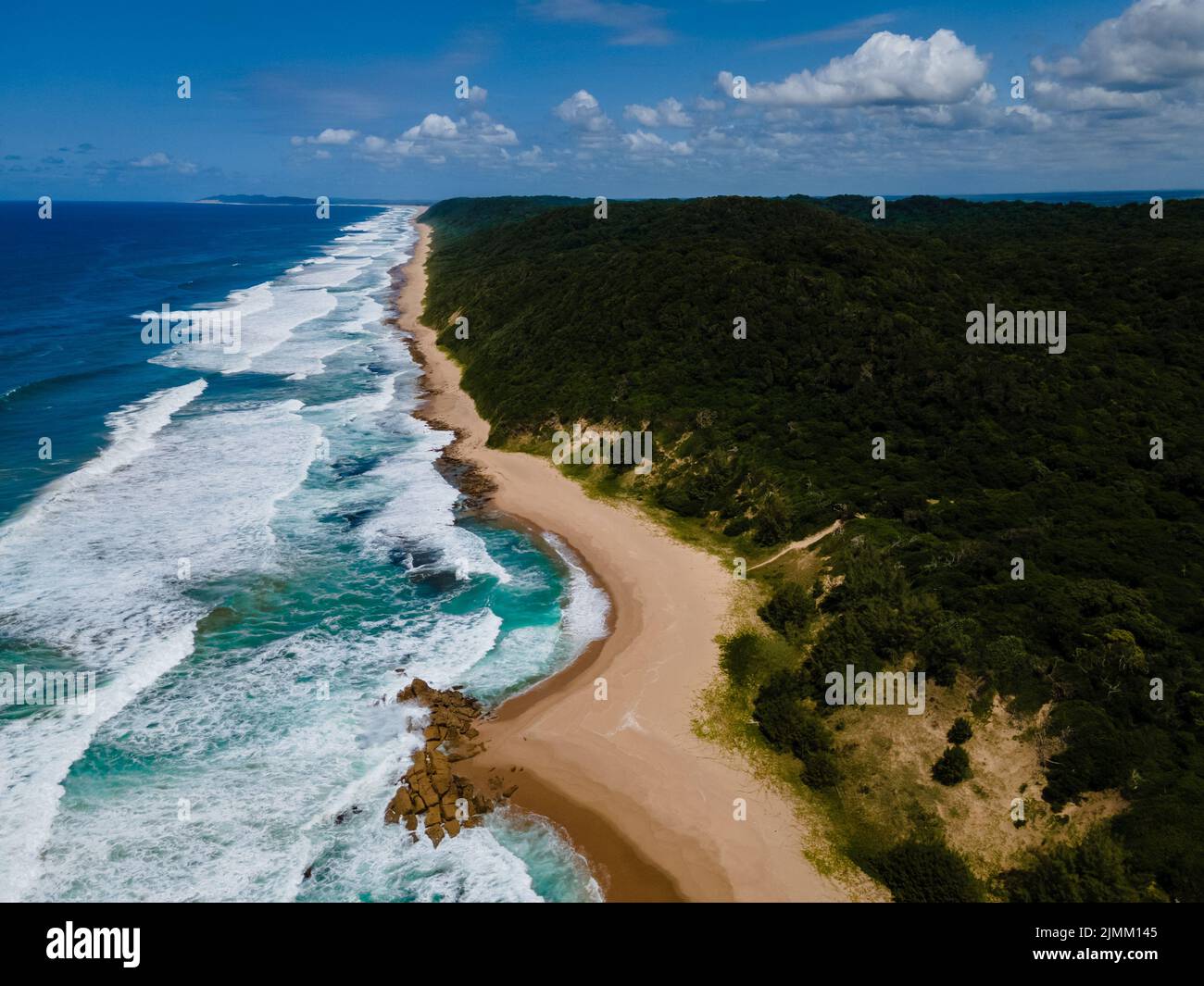 St Lucia South Africa, Rocks sand ocean, and blue coastal skyline at ...