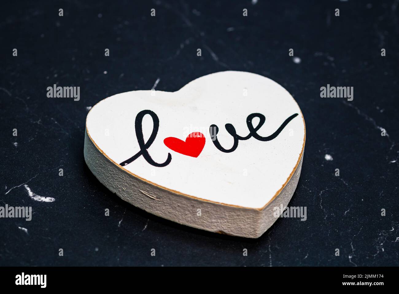 Heart decoration with LOVE message Stock Photo - Alamy
