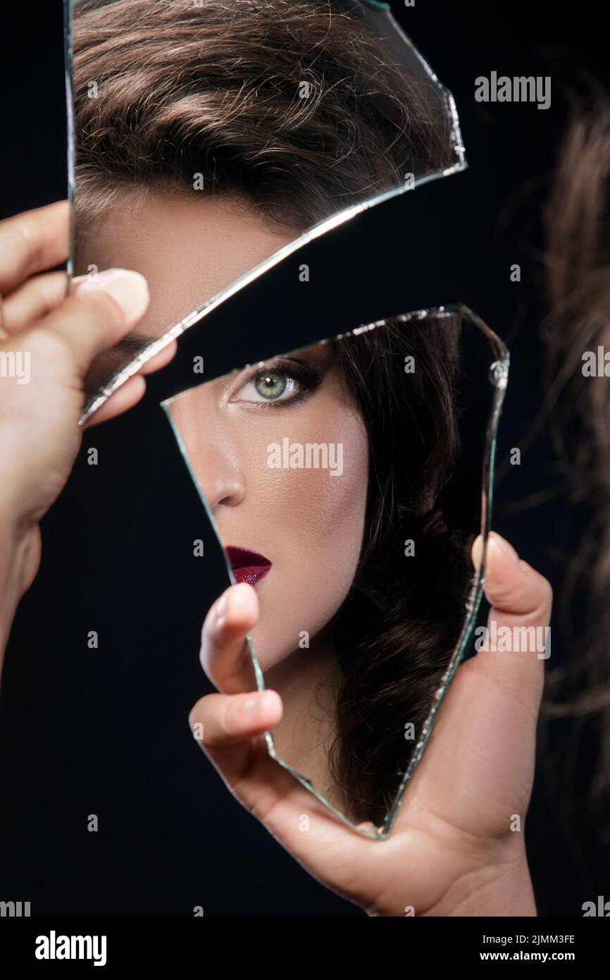 Broken mirror face hi-res stock photography and images - Alamy