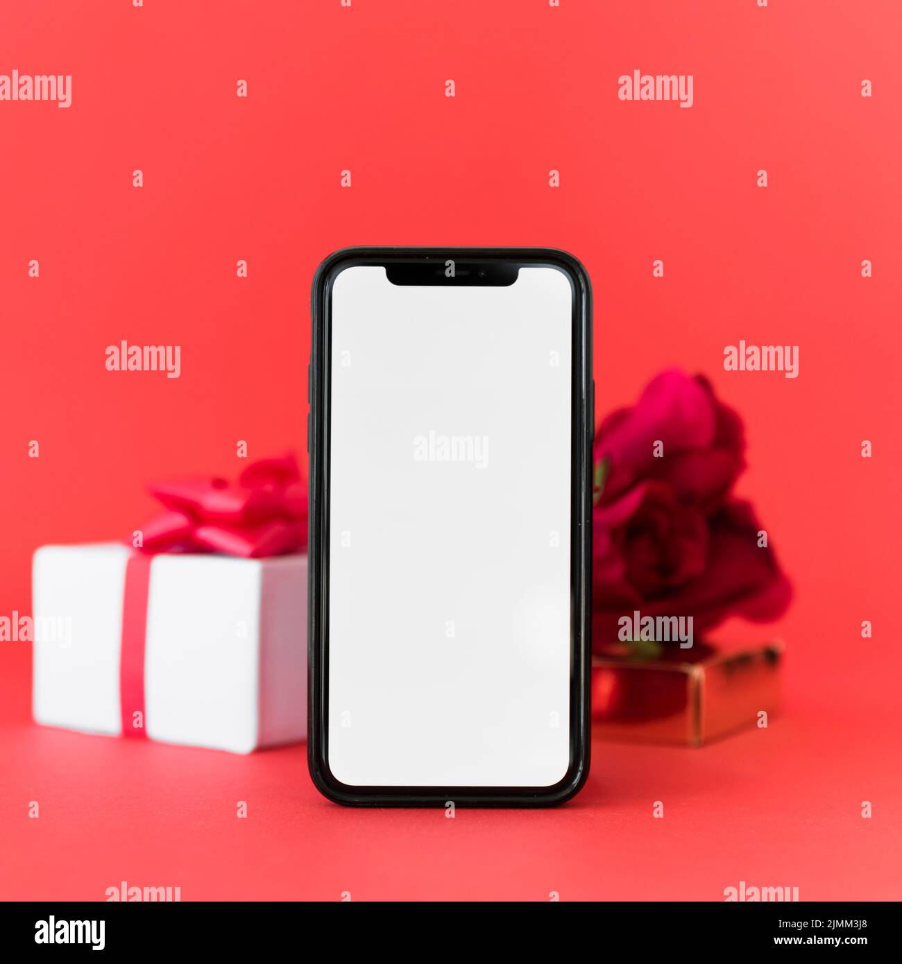 Smartphone with blank screen gift Stock Photo - Alamy