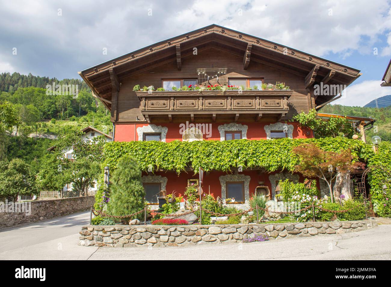 A traditional Austrian mountain farm house in the alpine village of ...
