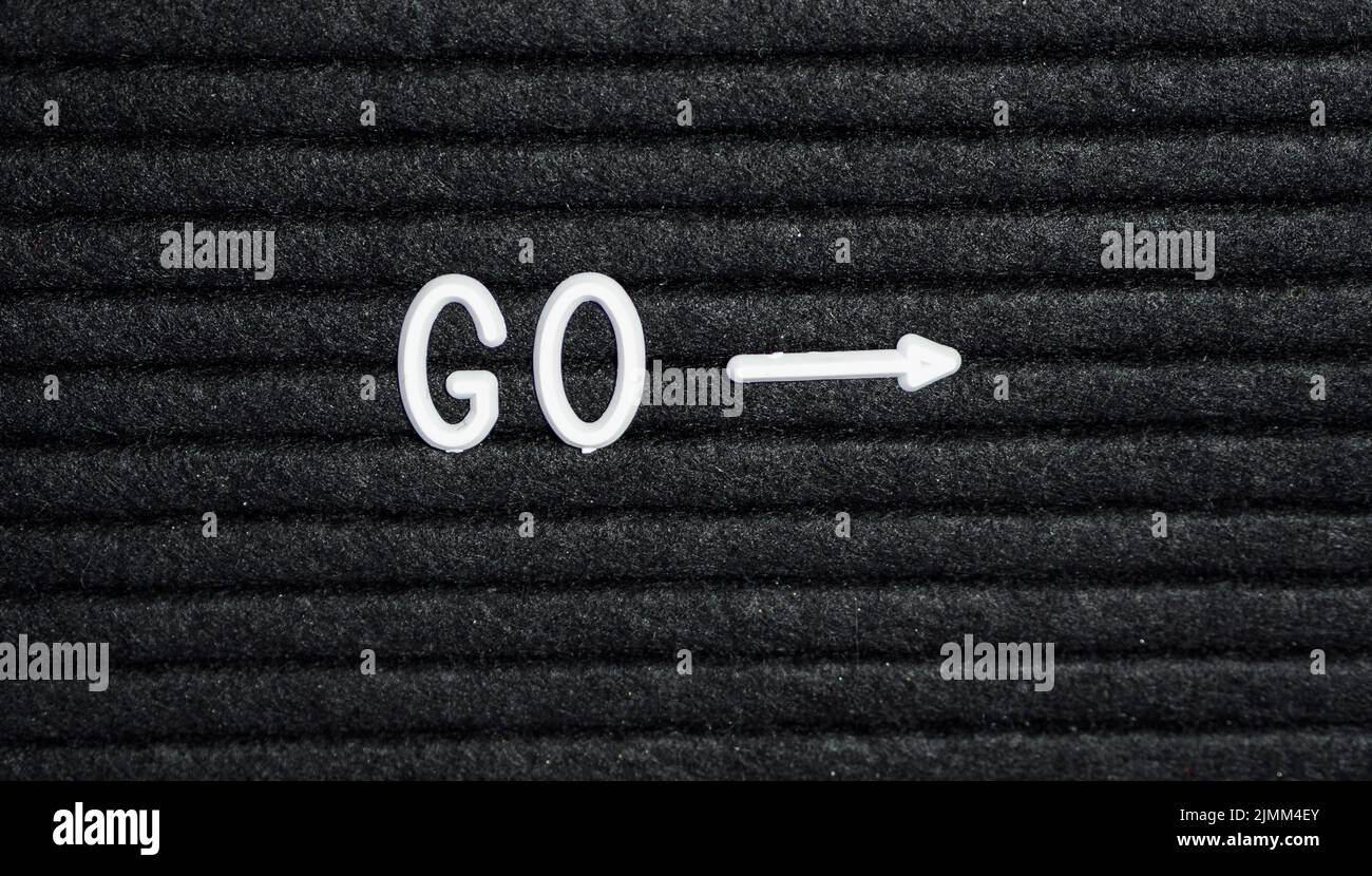 Arrow with go textile Stock Photo - Alamy