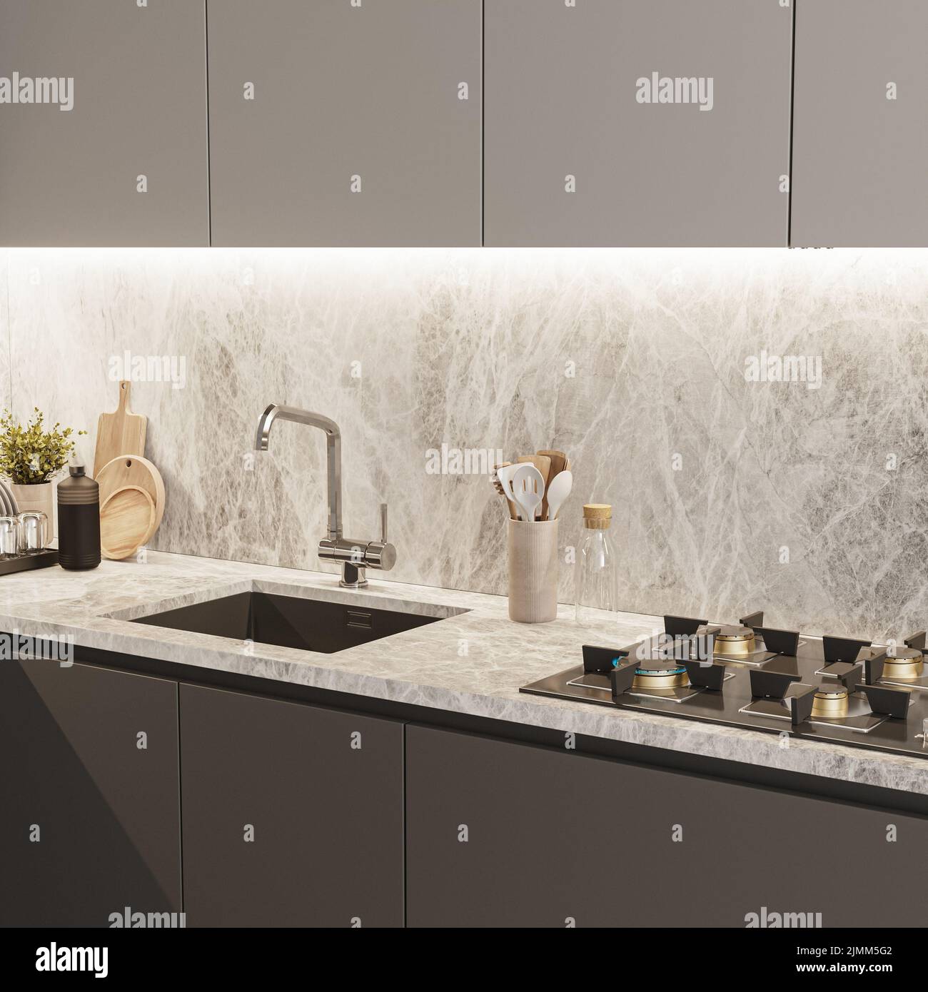 Modern kitchen interior, cabinets with cove light, stove and sink ...