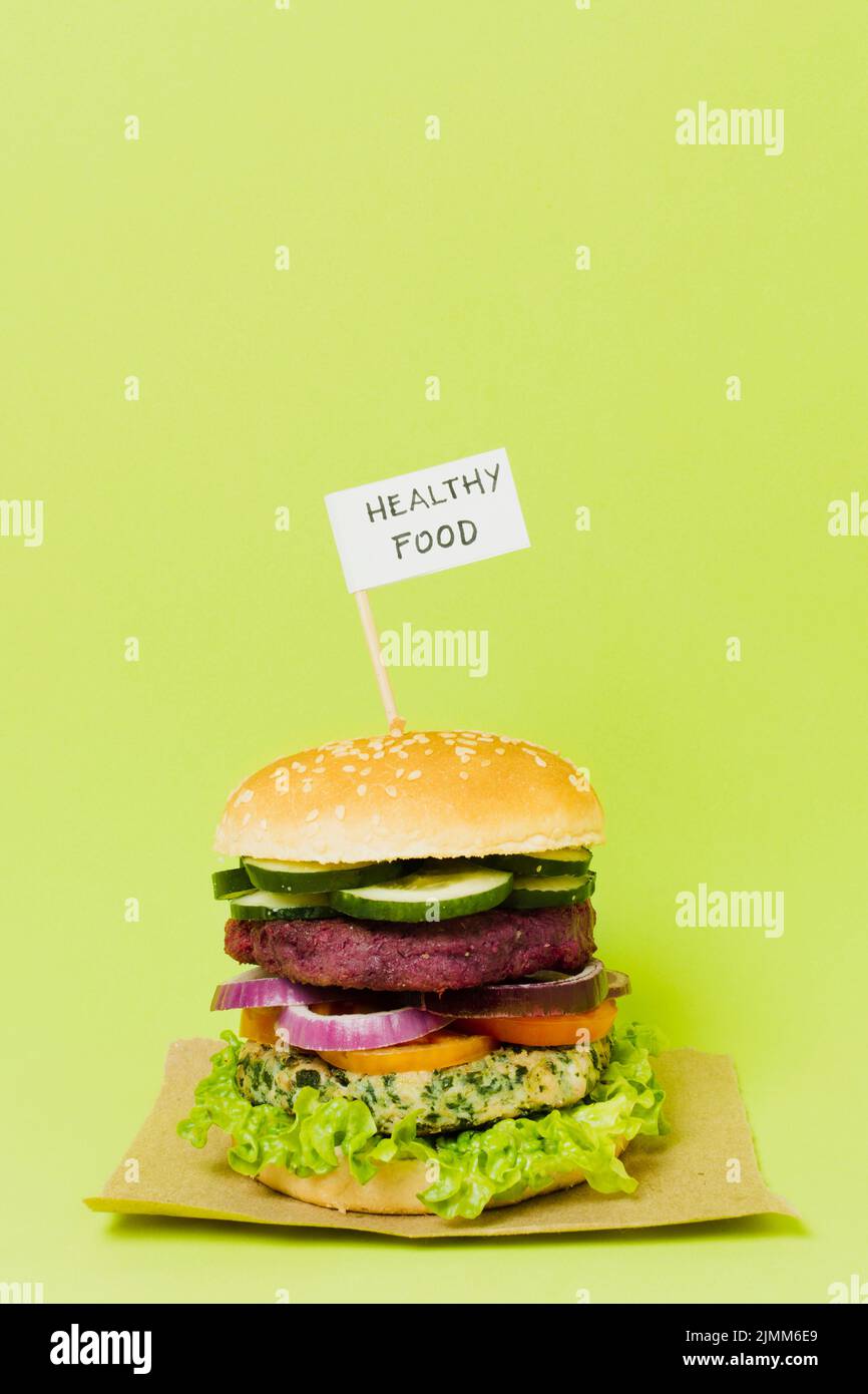 Tasty vegan burger with healthy food sign Stock Photo - Alamy