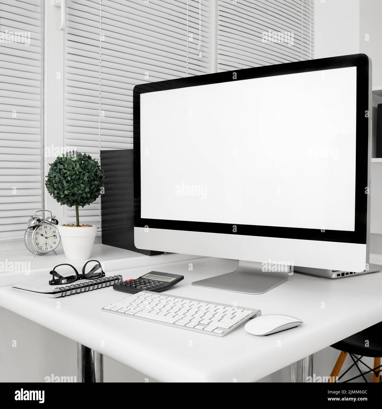 Workspace with computer screen keyboard Stock Photo - Alamy