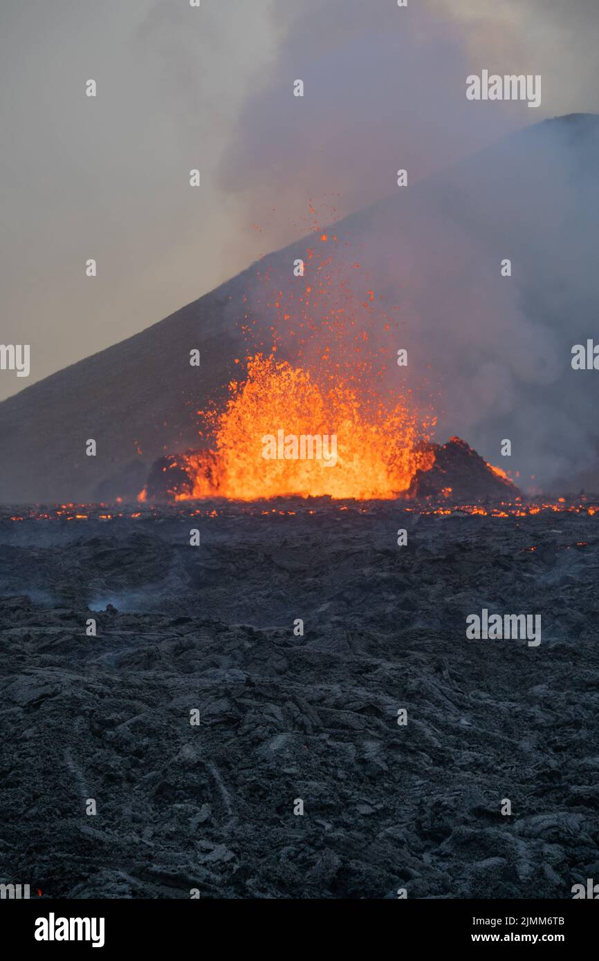 Lava spattering during a small volcanic eruption in Mt Fagradalsfjall ...