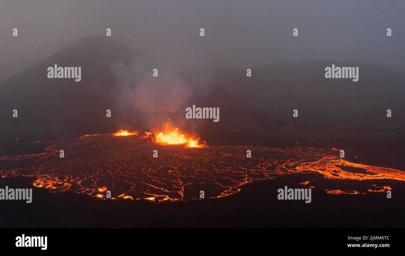 Lava spattering during a small volcanic eruption in Mt Fagradalsfjall ...