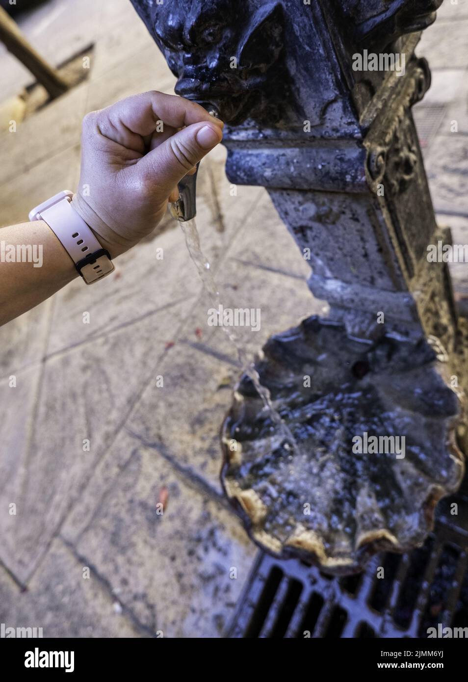 Detail of water falling into a drinking fountain Stock Photo - Alamy