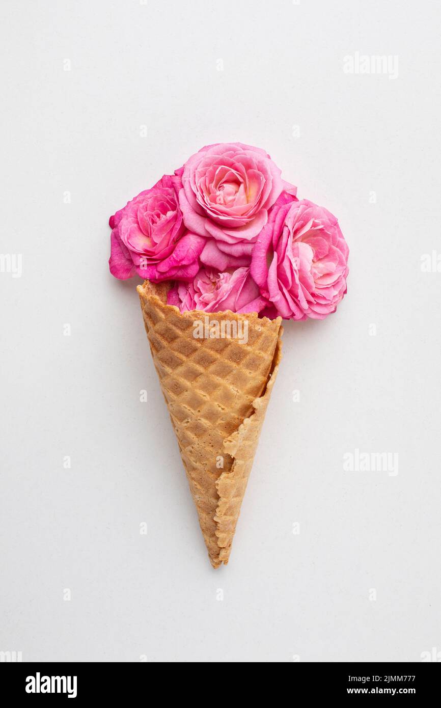 Ice cream cone with roses Stock Photo - Alamy