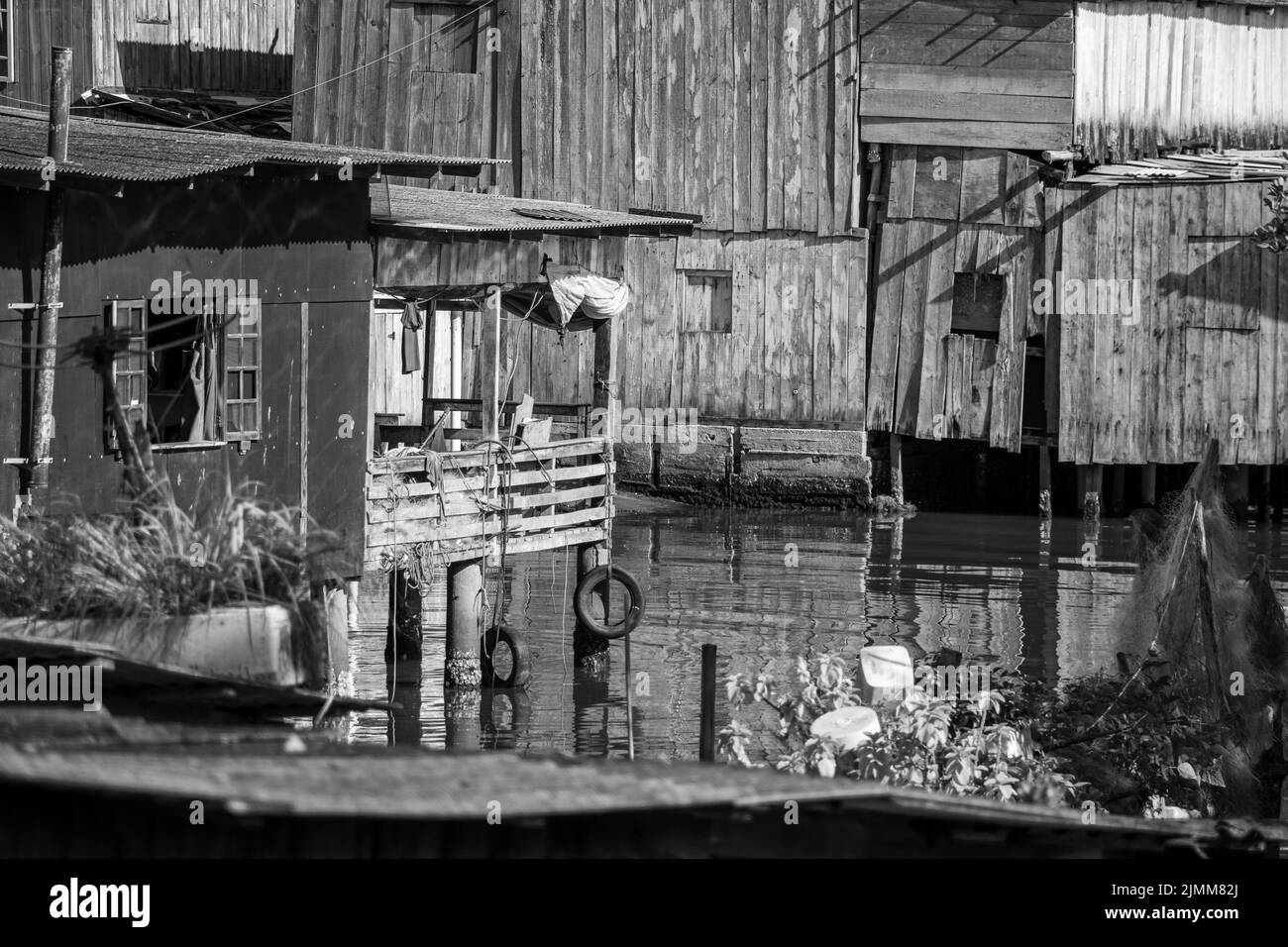 The old houses of the poor community living over the sea Stock Photo ...