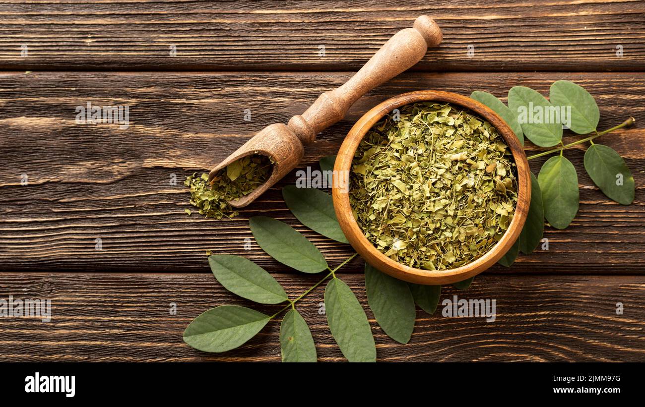 Natural crushed green leaves bowl top view Stock Photo - Alamy