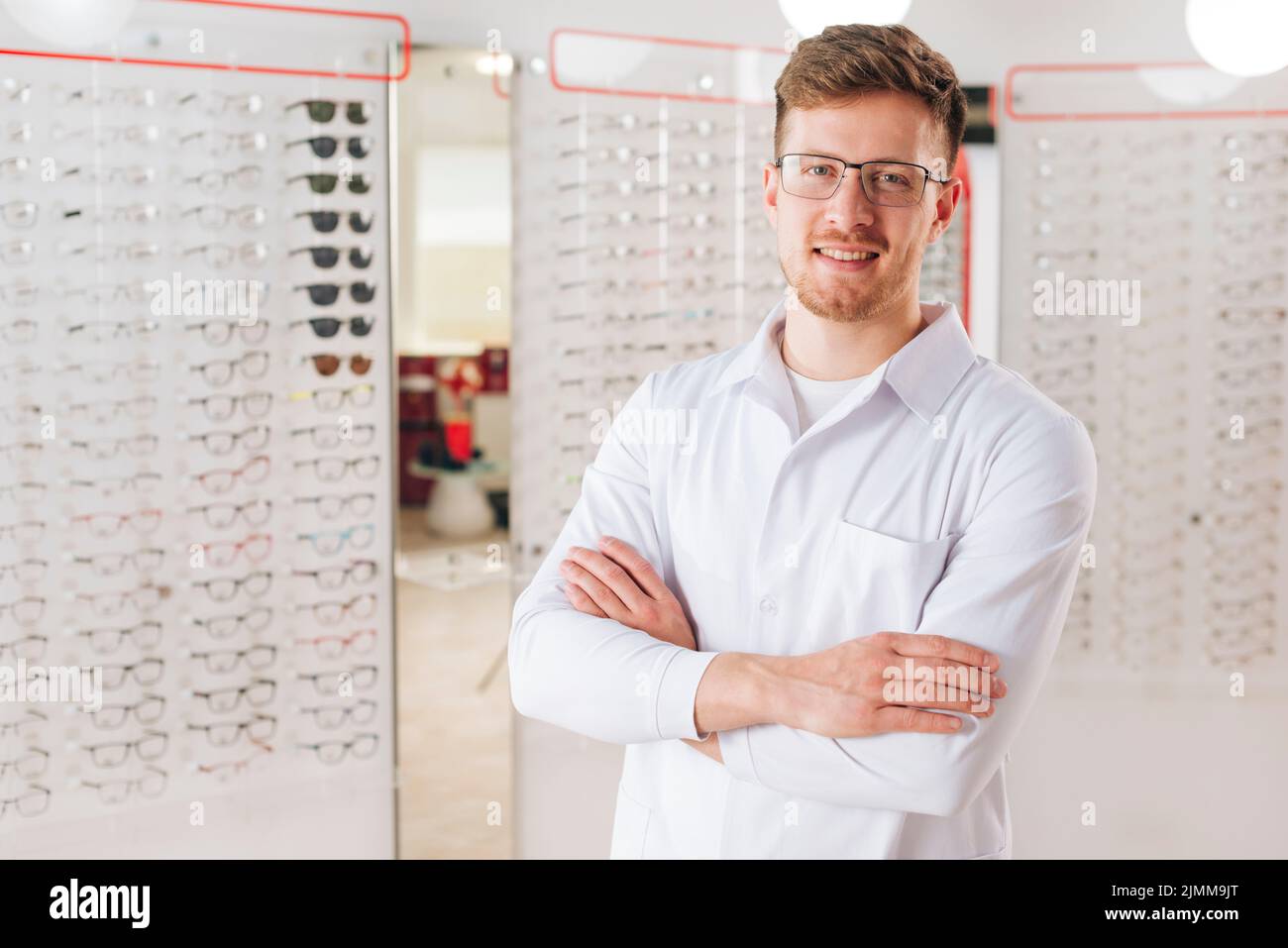 Portrait friendly male optometrist Stock Photo - Alamy