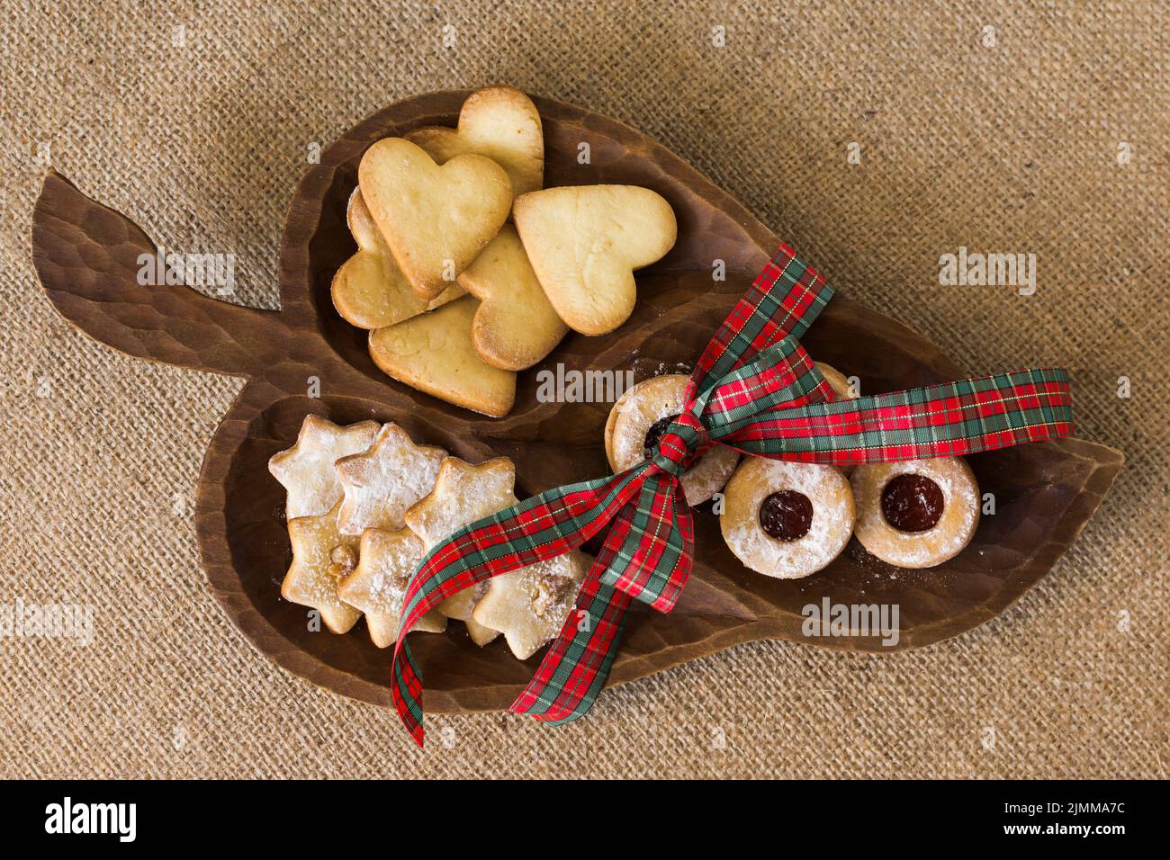 Wooden plate with different cookies table Stock Photo - Alamy Wooden plate with different cookies table Stock Photo - Alamy