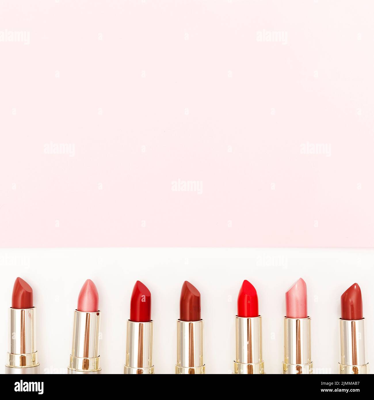Line metallic lipsticks white background Stock Photo - Alamy