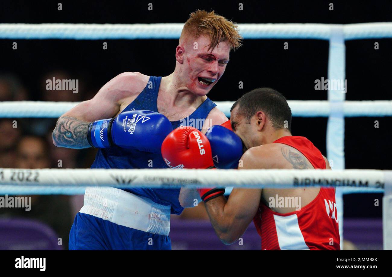 India's Amit Panghal (Red) and England's Kiaran Macdonald (Blue) in the ...