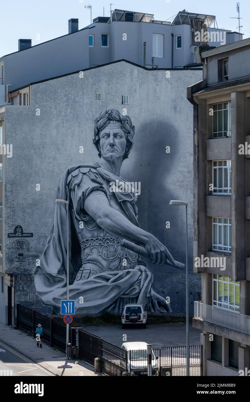 A large mural of a Roman soldier on a building in Lugo Stock Photo - Alamy